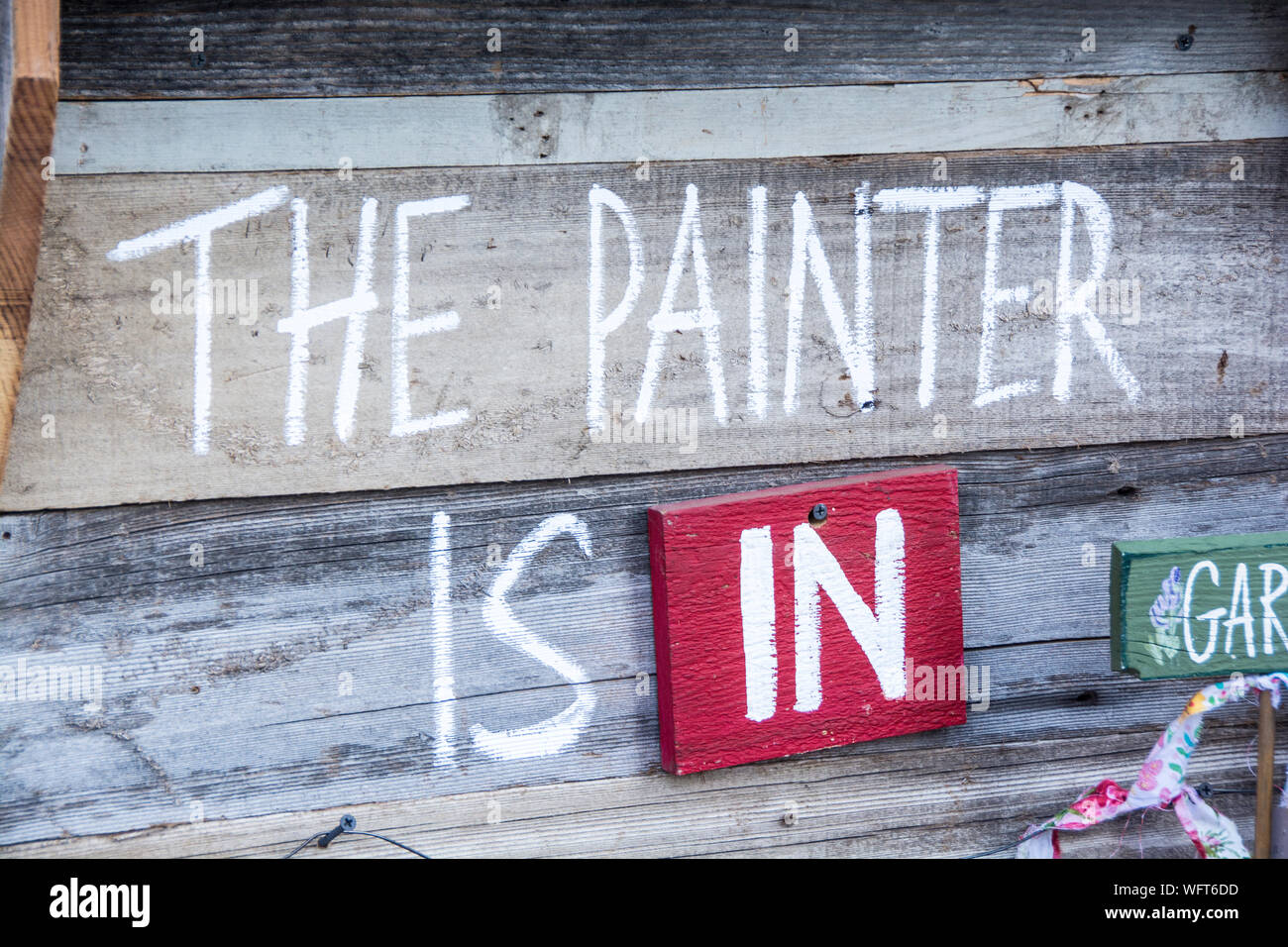 A sign saying, "The painter is in Stock Photo - Alamy