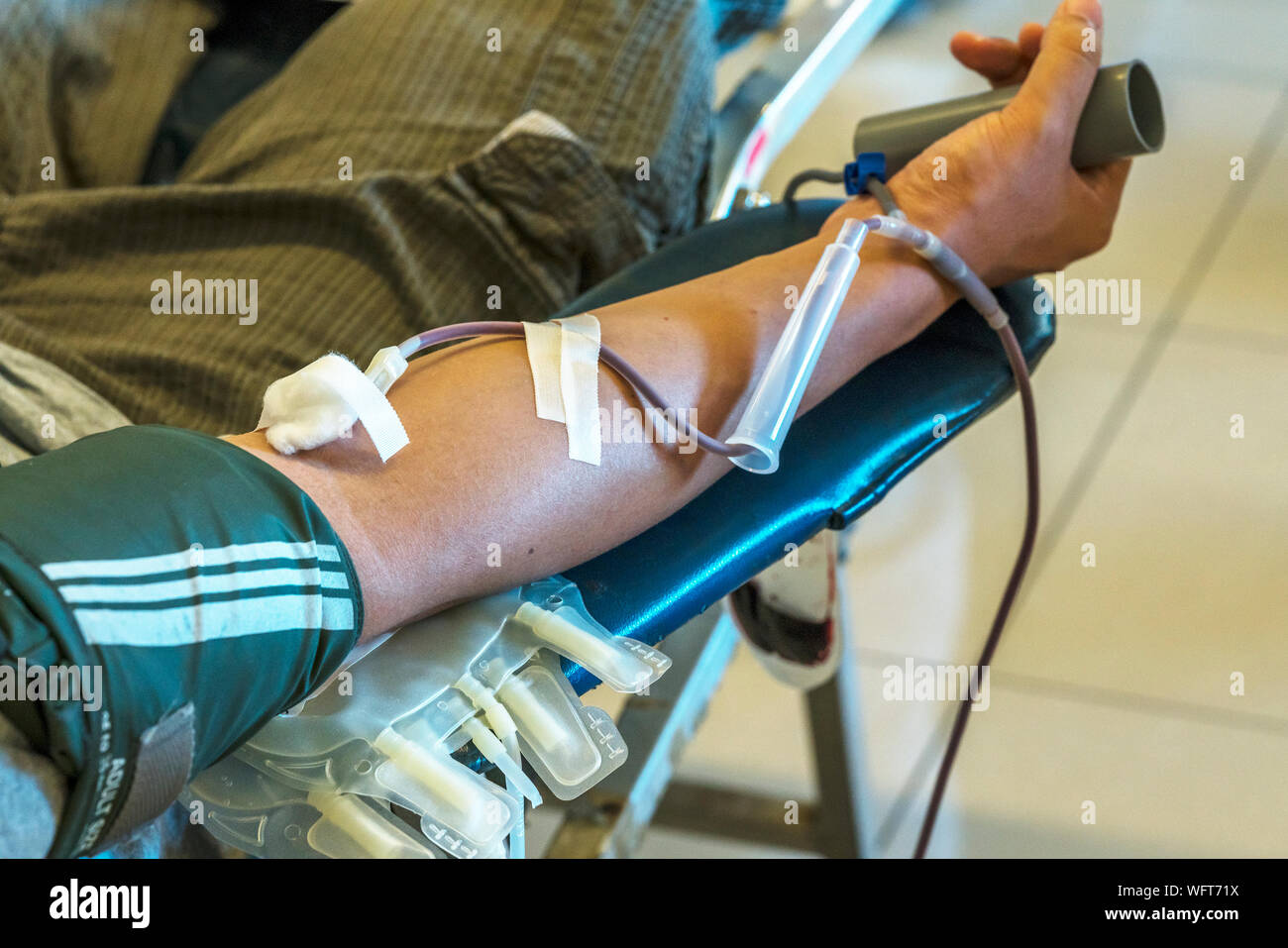 Human hand on iv drip hi-res stock photography and images - Alamy