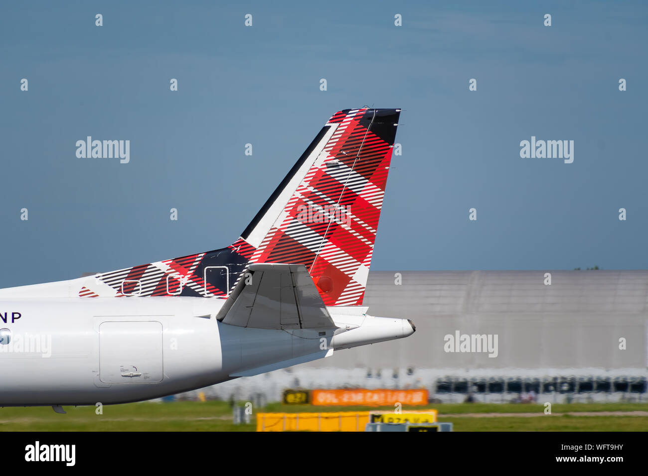 MANCHESTER, UNITED KINGDOM - AUGUST 24, 2019: Loganair Saab 2000 tail ...