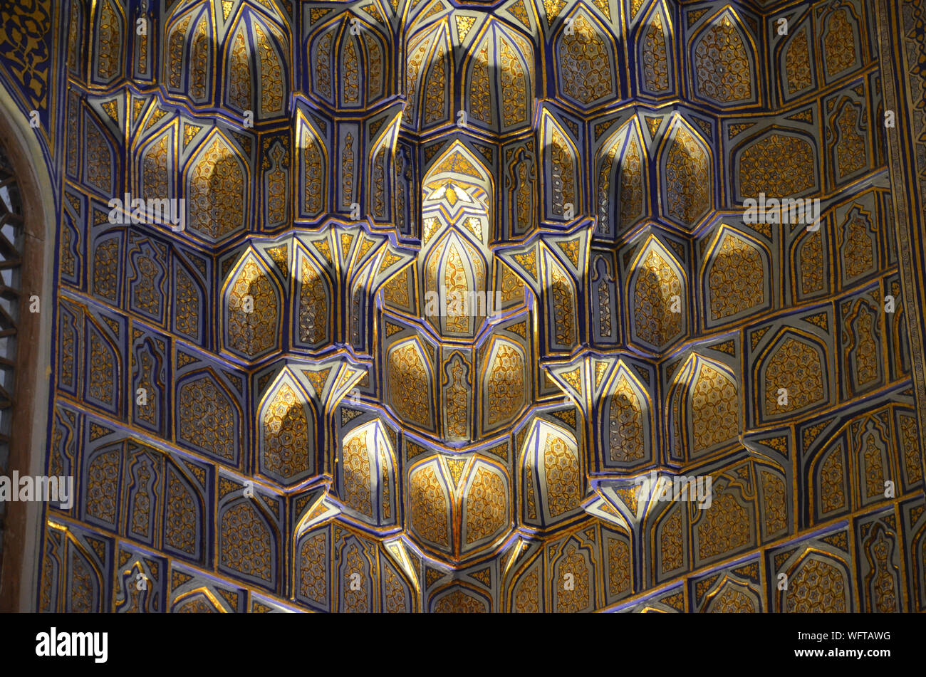 Elaborated ceiling and wall ornaments at the Gur-e Amir mausoleum ...