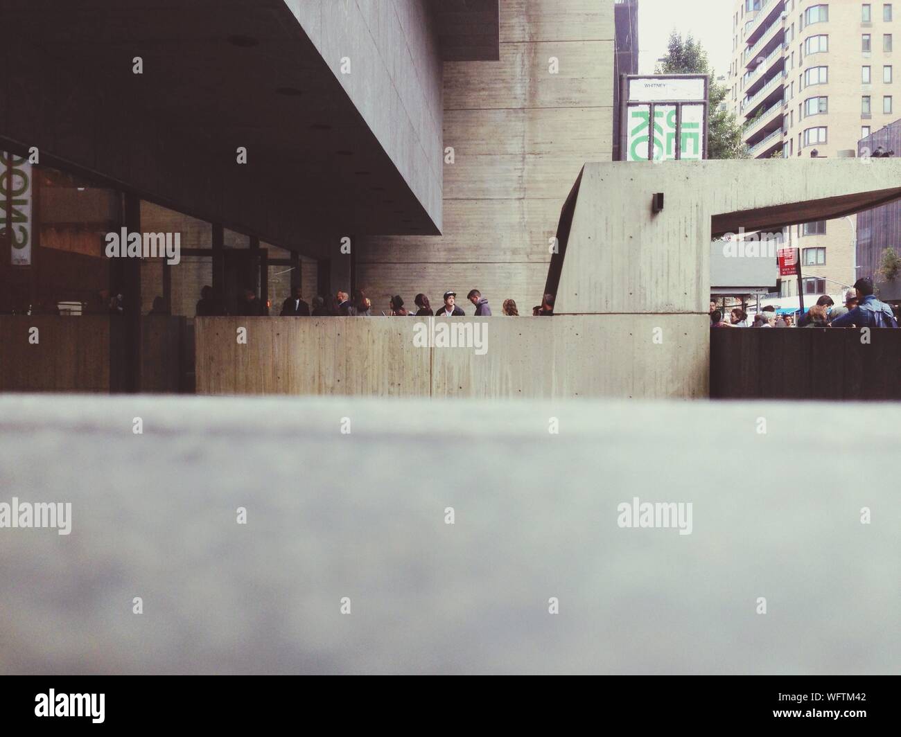 People entering building hi-res stock photography and images - Alamy