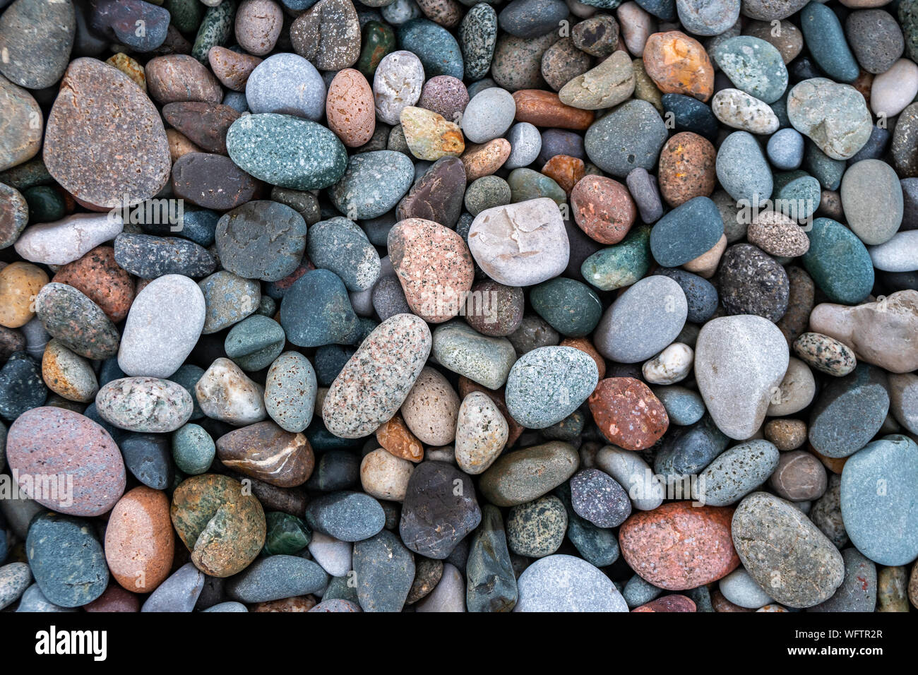 Rounded grey granite rocks beach hi-res stock photography and images ...