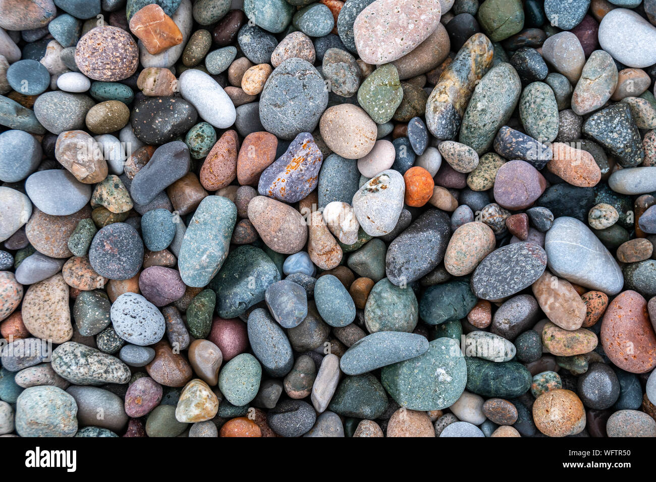 Rounded grey granite rocks beach hi-res stock photography and images ...