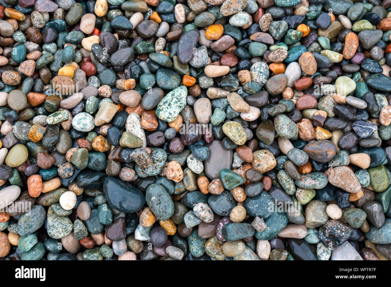 Rounded grey granite rocks beach hi-res stock photography and images ...