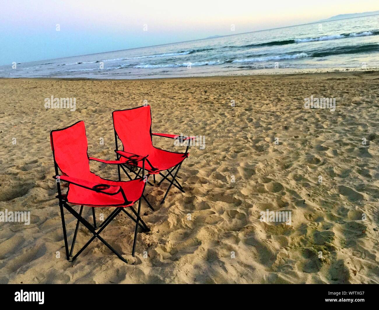 Red beach chairs hi-res stock photography and images - Alamy