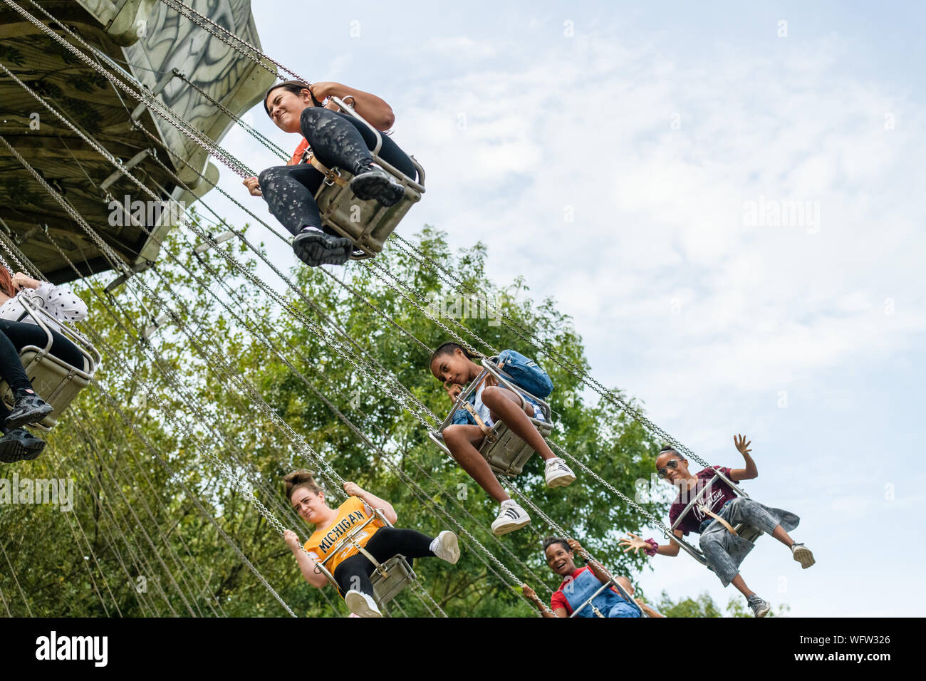 Spinning ride swings hi-res stock photography and images - Alamy