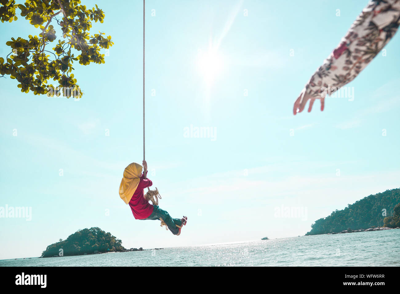 Girl on rope hi-res stock photography and images - Alamy