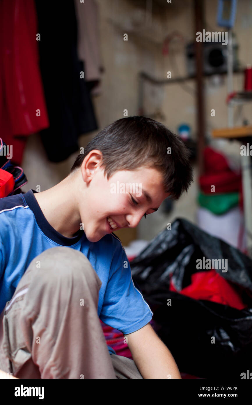 Boy Sitting Down On The Floor High Resolution Stock Photography and ...