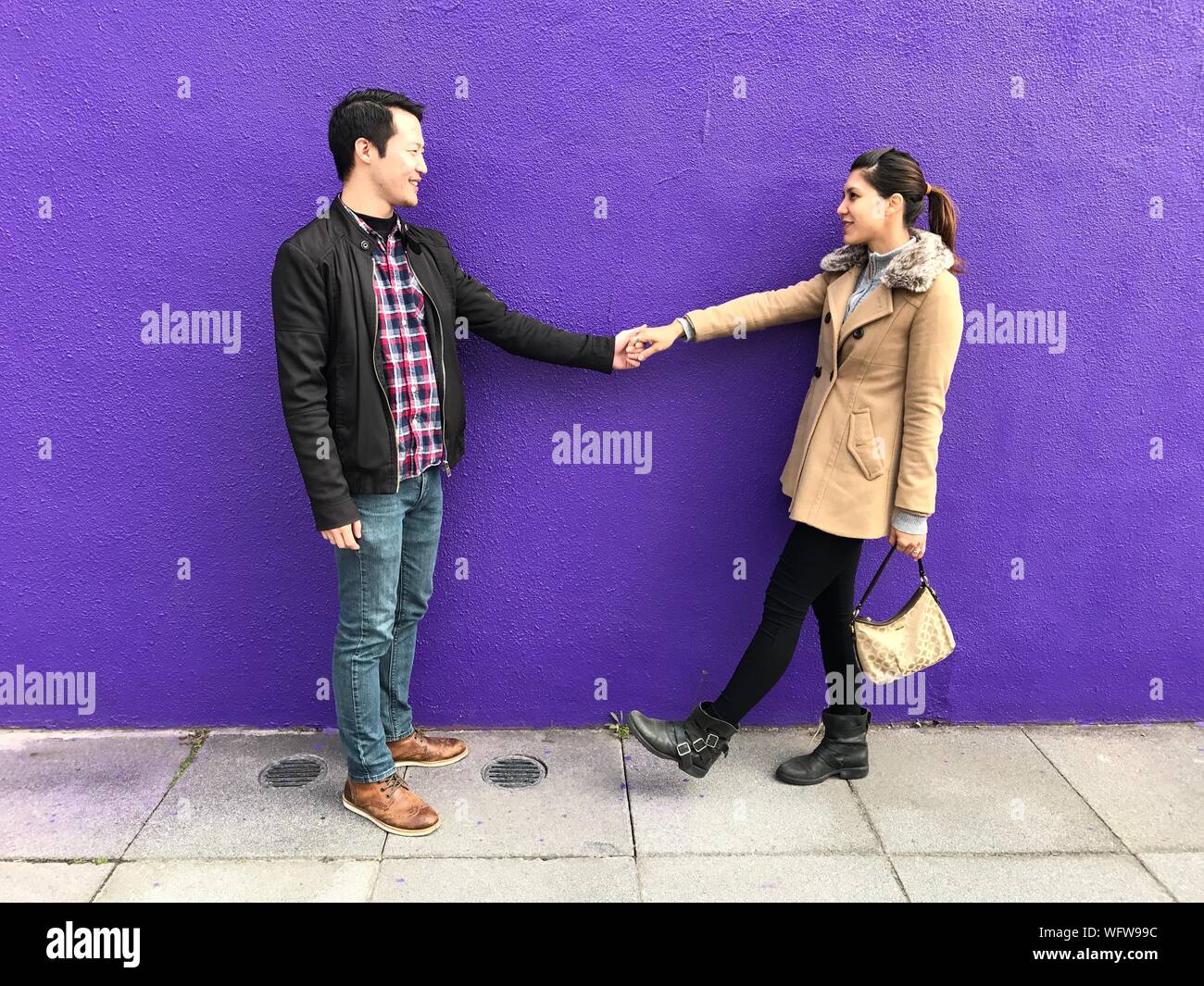Two purple hands hi-res stock photography and images - Alamy