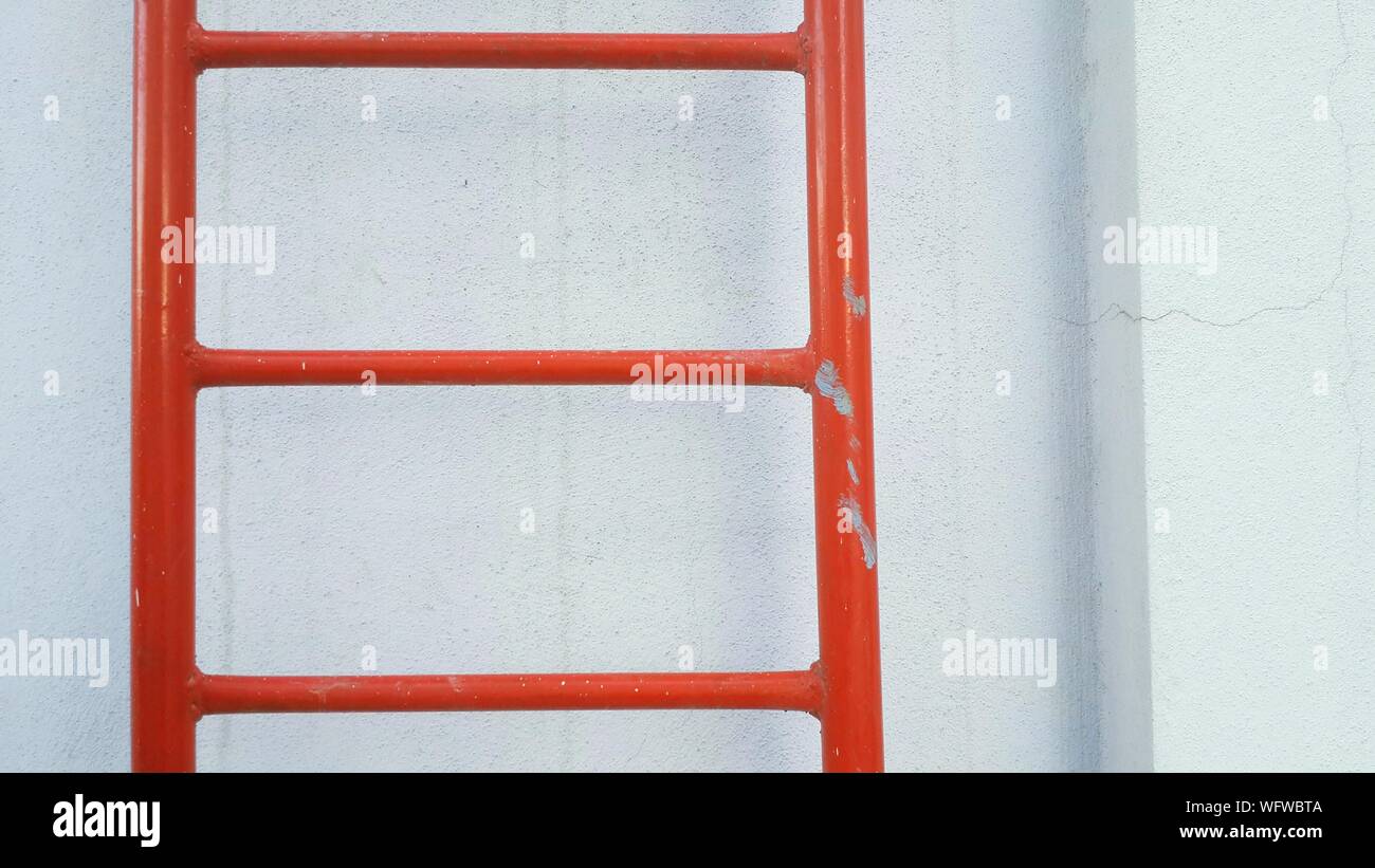 Red wall ladder hi-res stock photography and images - Alamy