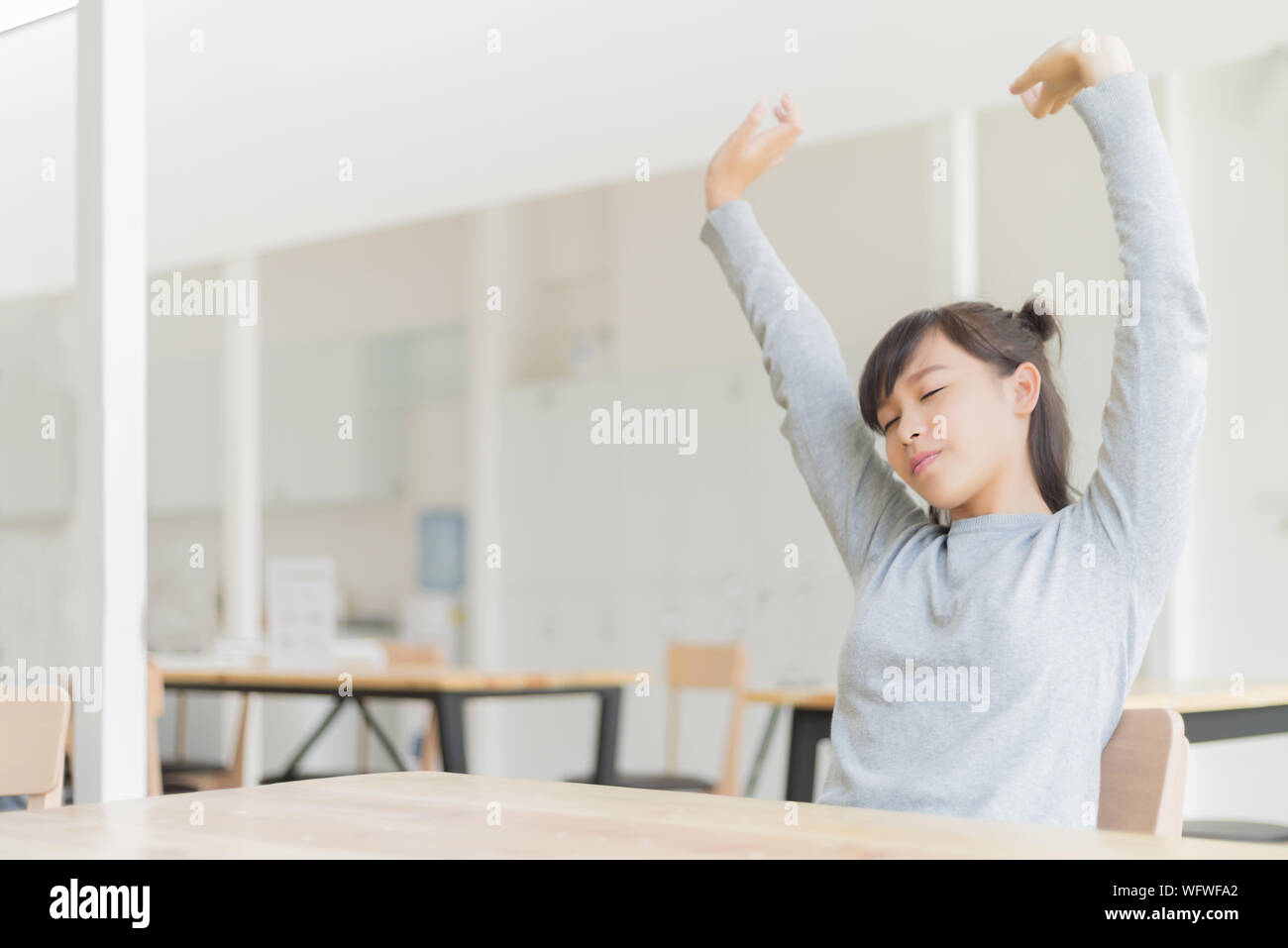 Stretching arms hi-res stock photography and images - Alamy