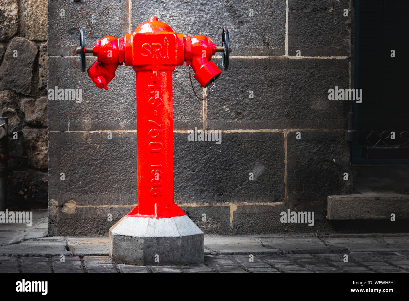 Fire Hydrant On Wall High Resolution Stock Photography and Images - Alamy