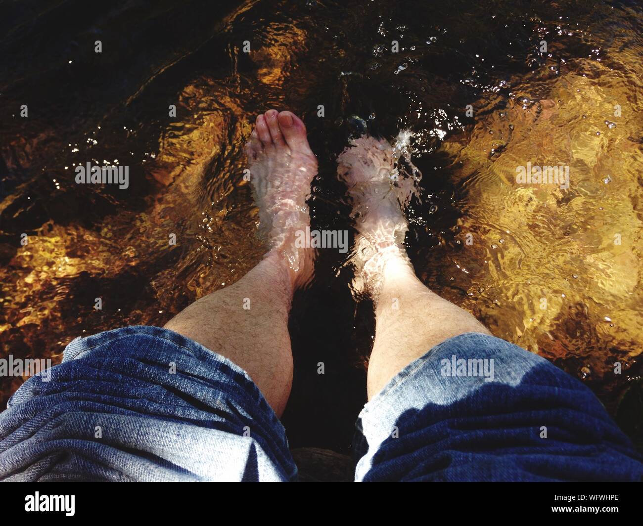 Man dipping hi-res stock photography and images - Alamy