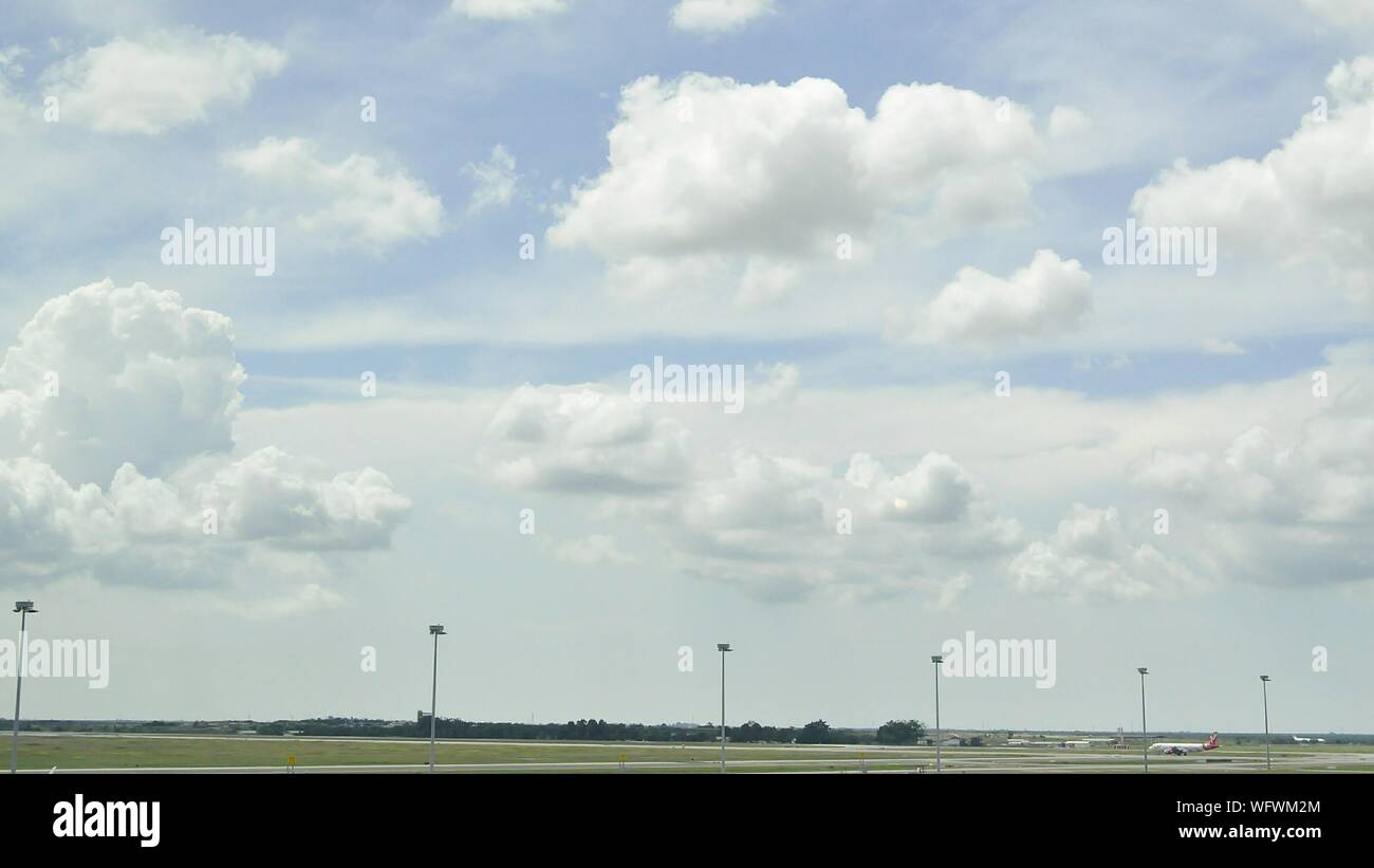 Cloudy Runway High Resolution Stock Photography and Images - Alamy