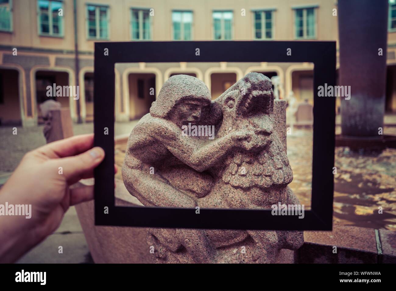 Photography holding statue sculpture hi-res stock photography and ...