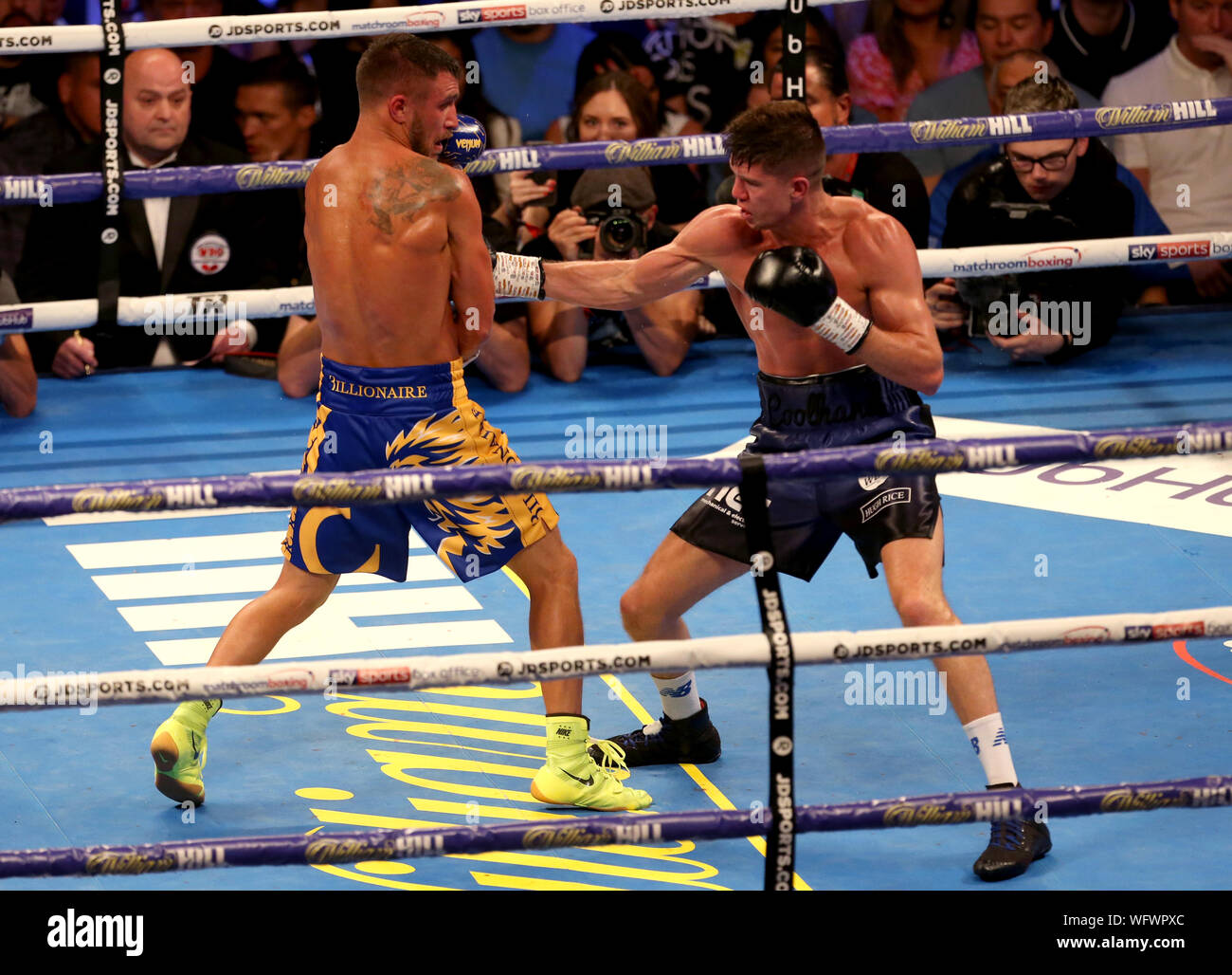 Vasiliy Lomachenko (left) and Luke Campbell in action during the WBC, WBO, WBA & Ring Magazine ...
