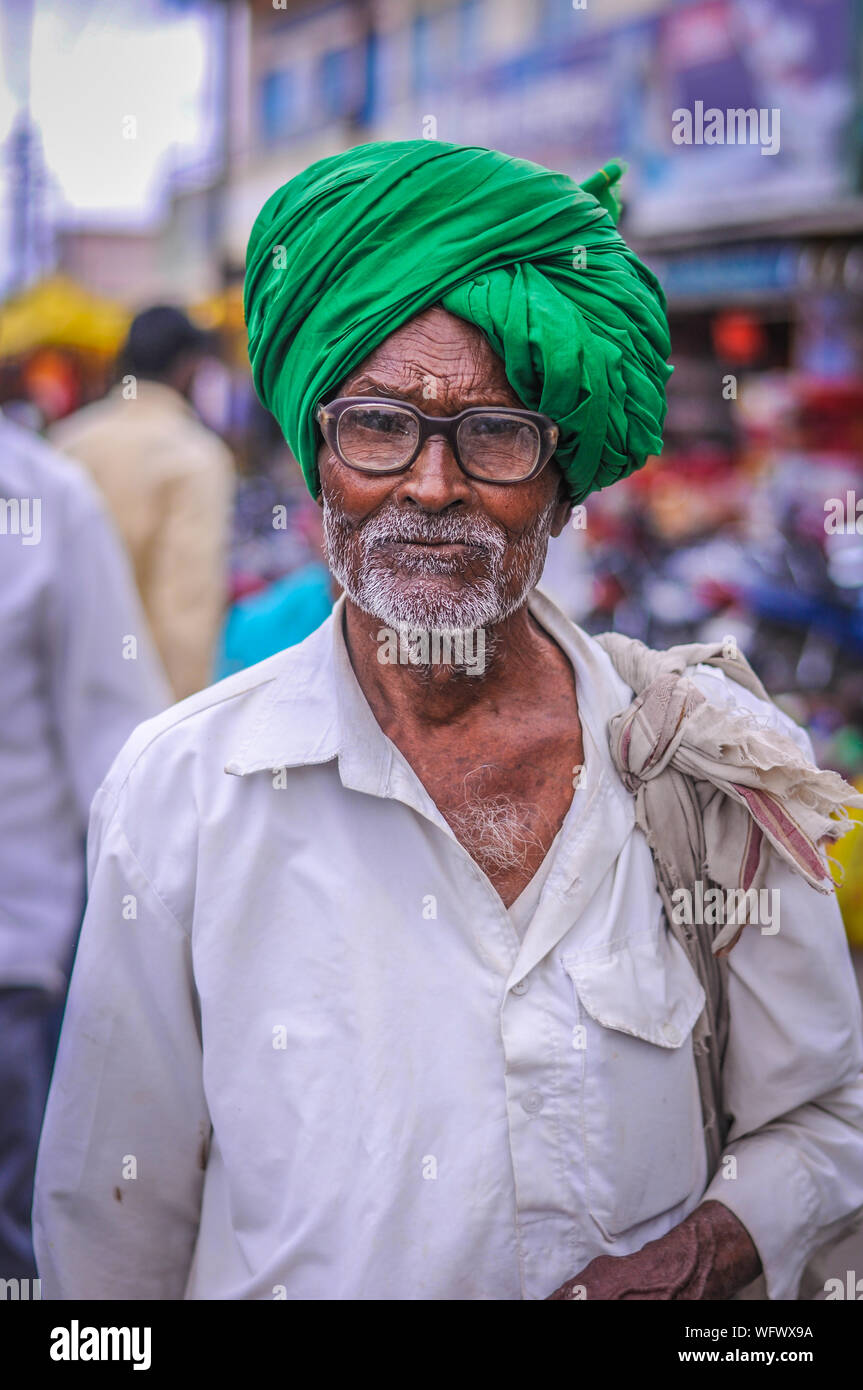 Indian man walking in the street hi-res stock photography and images ...