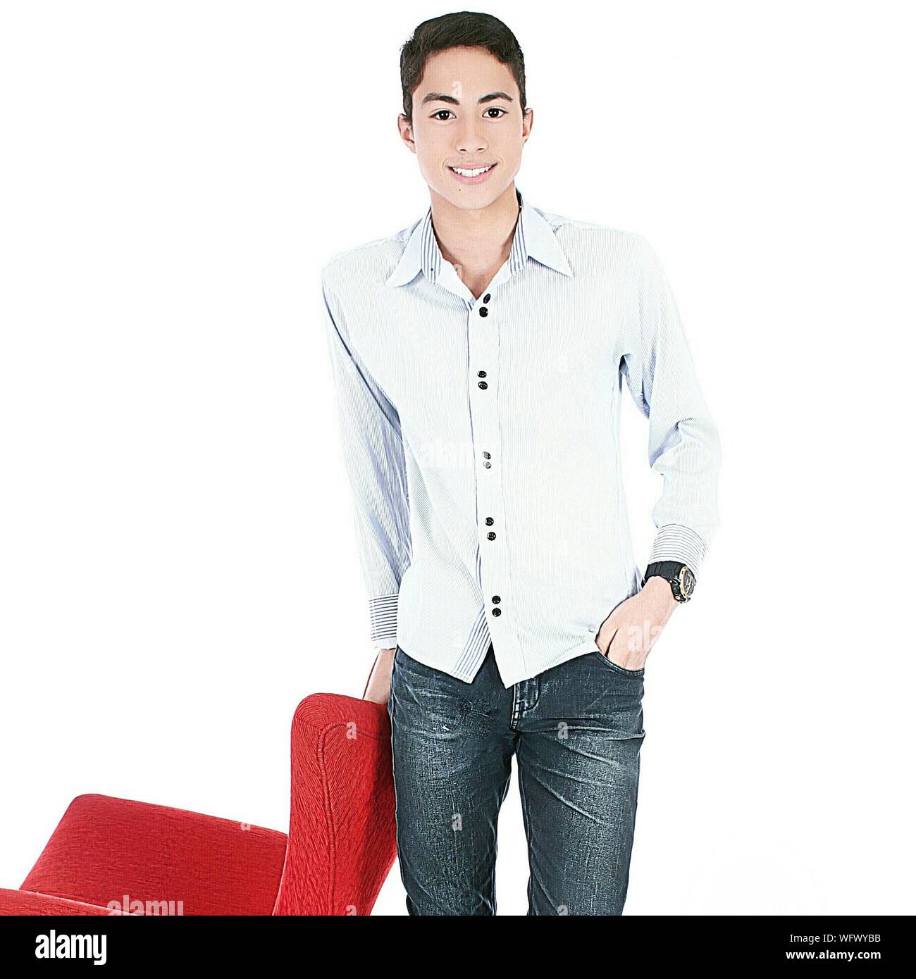 Man in red chair hi-res stock photography and images - Alamy