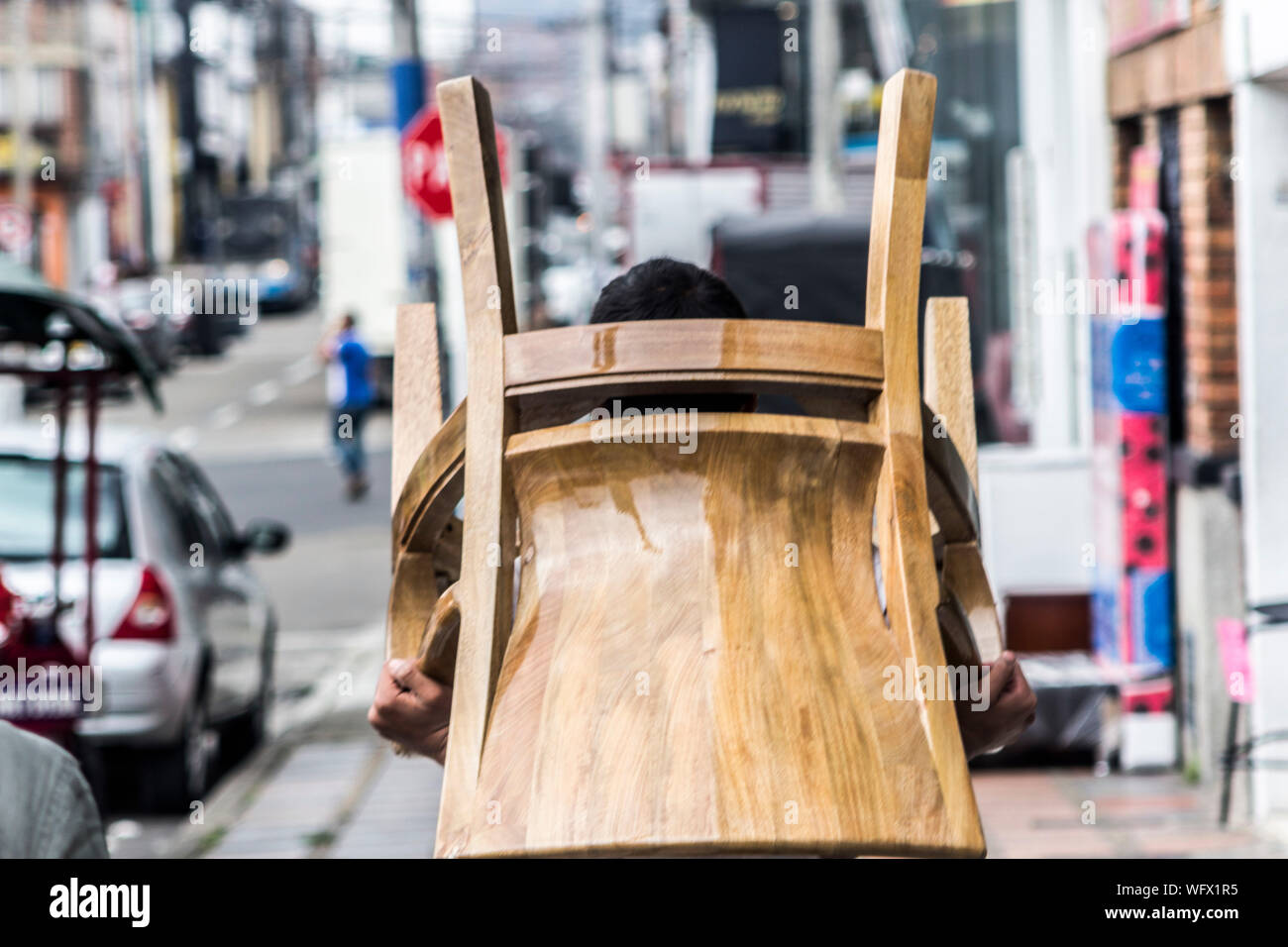Man chair carrying hi-res stock photography and images - Alamy