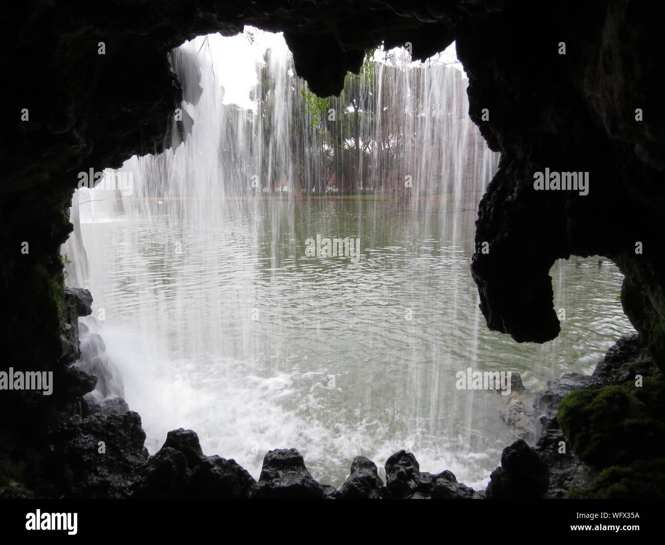 Water flowing from cave hi-res stock photography and images - Alamy