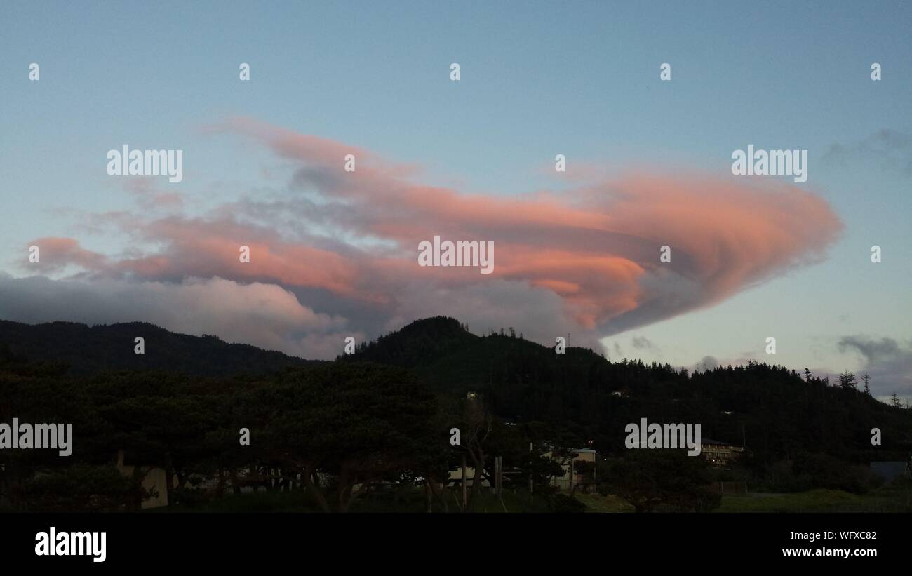 Cloud over mountains hi-res stock photography and images - Alamy