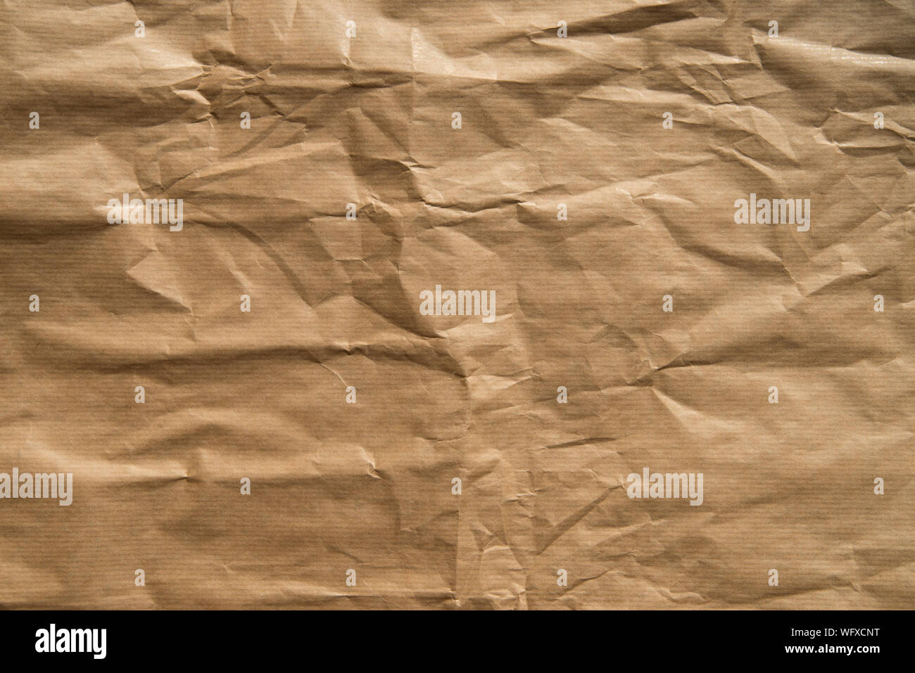 brown color creased paper texture background Stock Photo - Alamy