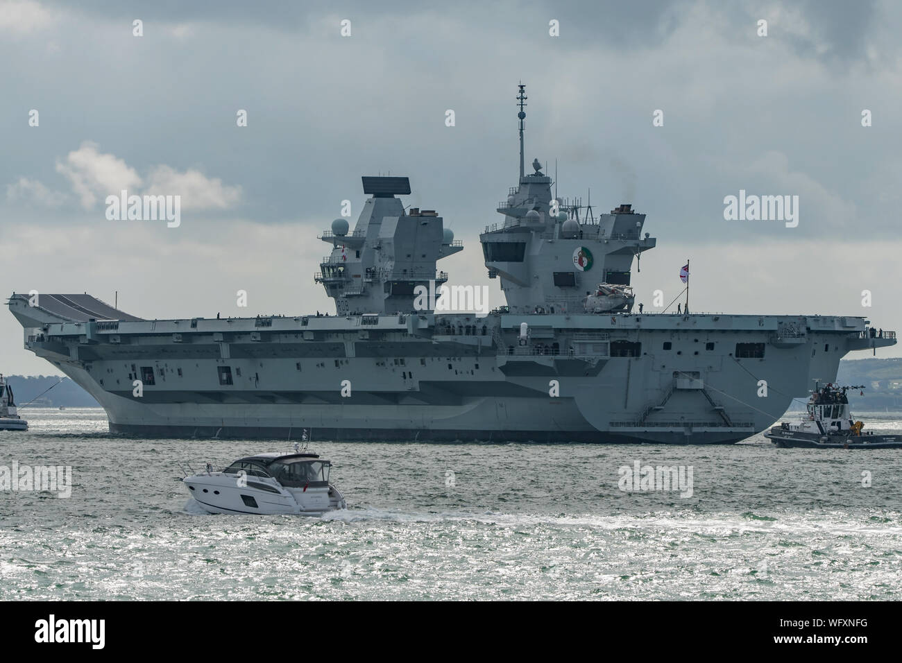 The Royal Navy aircraft carrier HMS Queen Elizabeth (R08) left ...