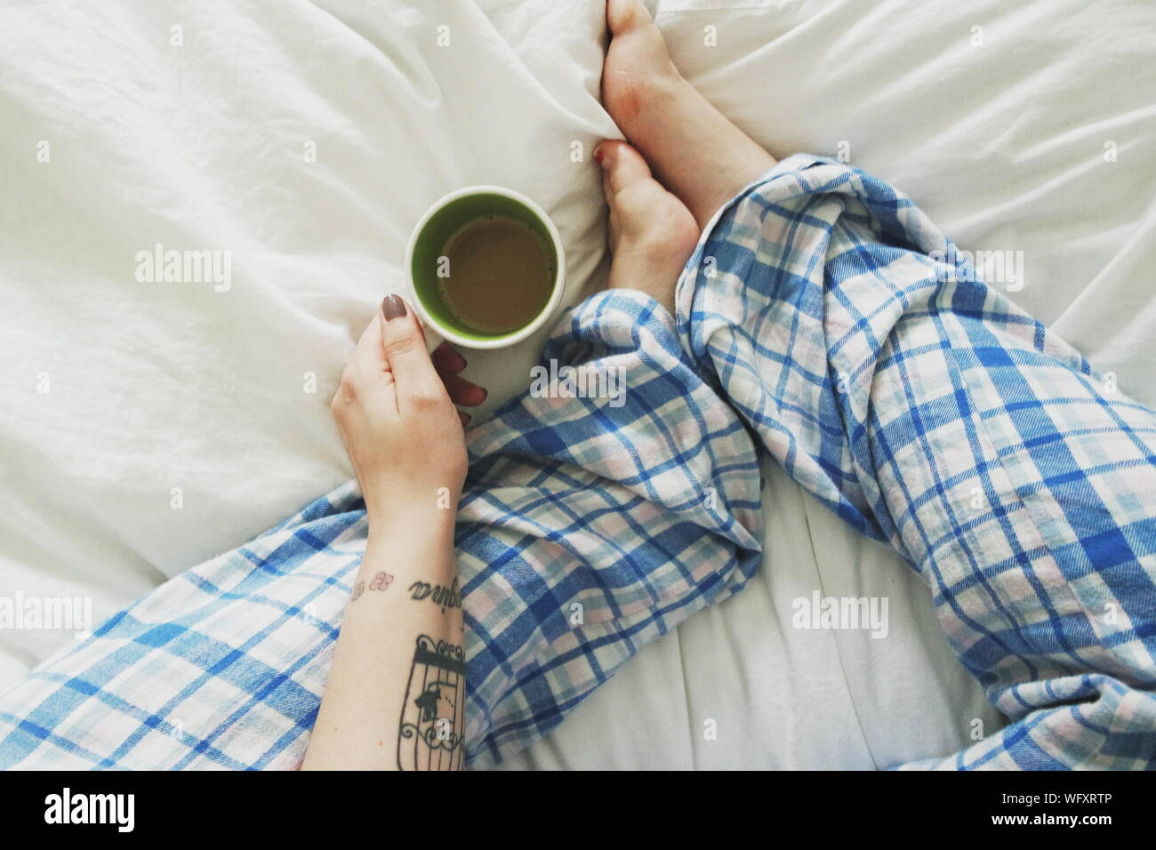 Person relaxing drinking tea hi-res stock photography and images - Alamy
