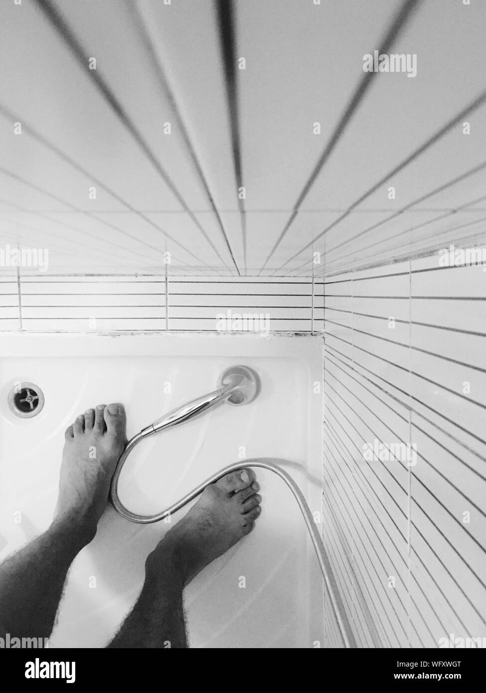 Man standing with tube hi-res stock photography and images - Alamy