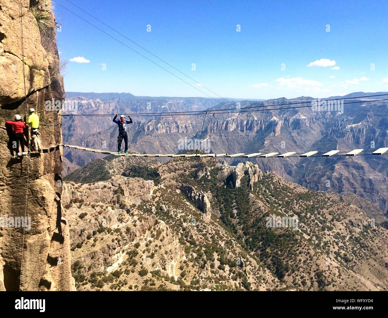 Rope bridge mountains hi-res stock photography and images - Alamy