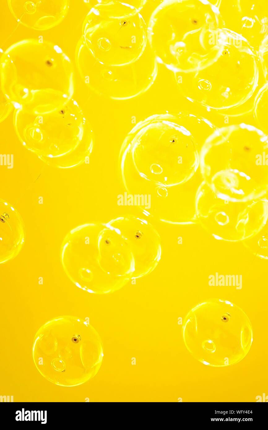 Yellow bubbles hi-res stock photography and images - Alamy