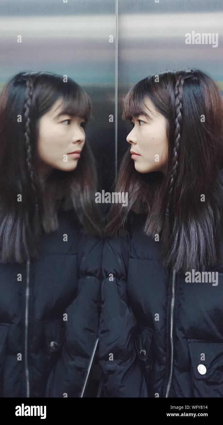 Looking at reflection not mirror hi-res stock photography and images ...