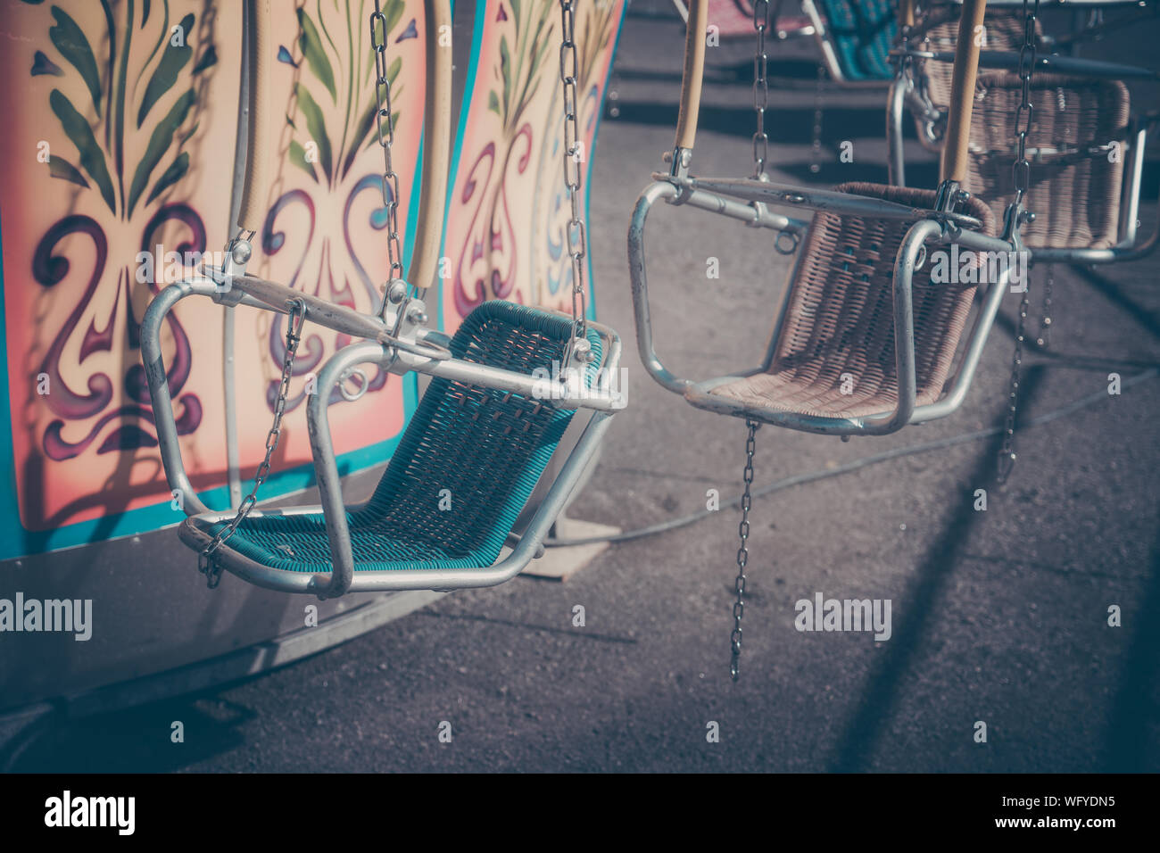 Empty amusement ride seats hi-res stock photography and images - Alamy