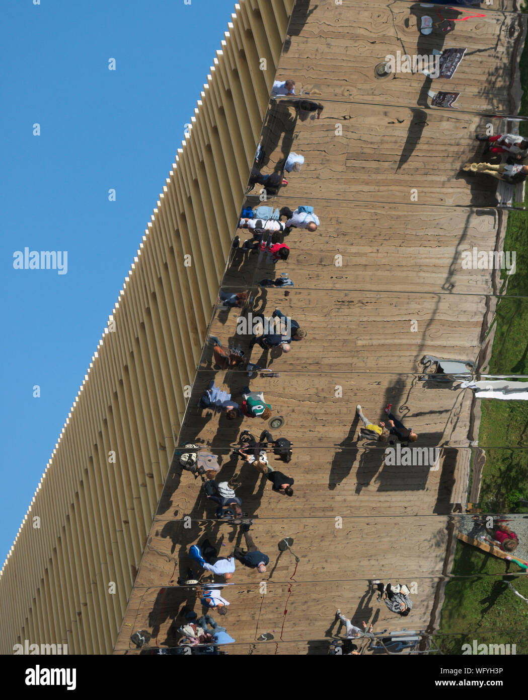 Mirror reflection on people walking hi-res stock photography and images ...