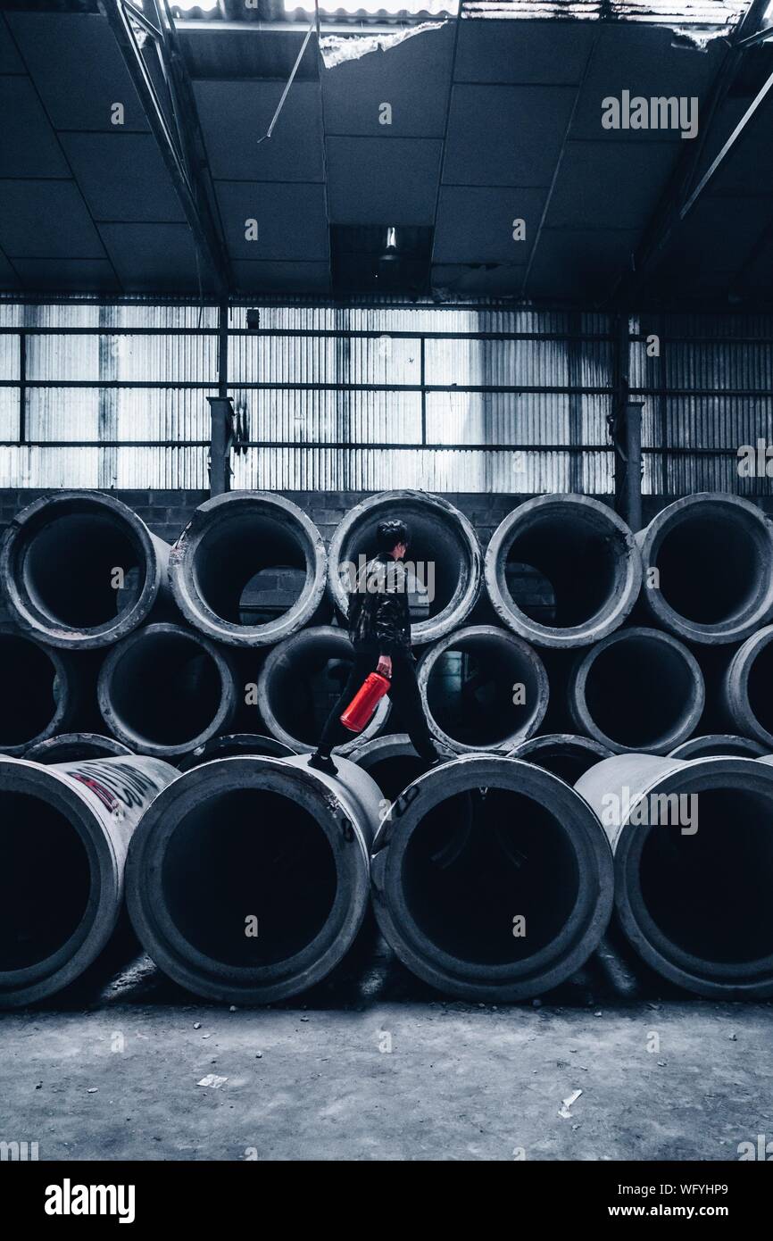 Walking on pipe hi-res stock photography and images - Alamy