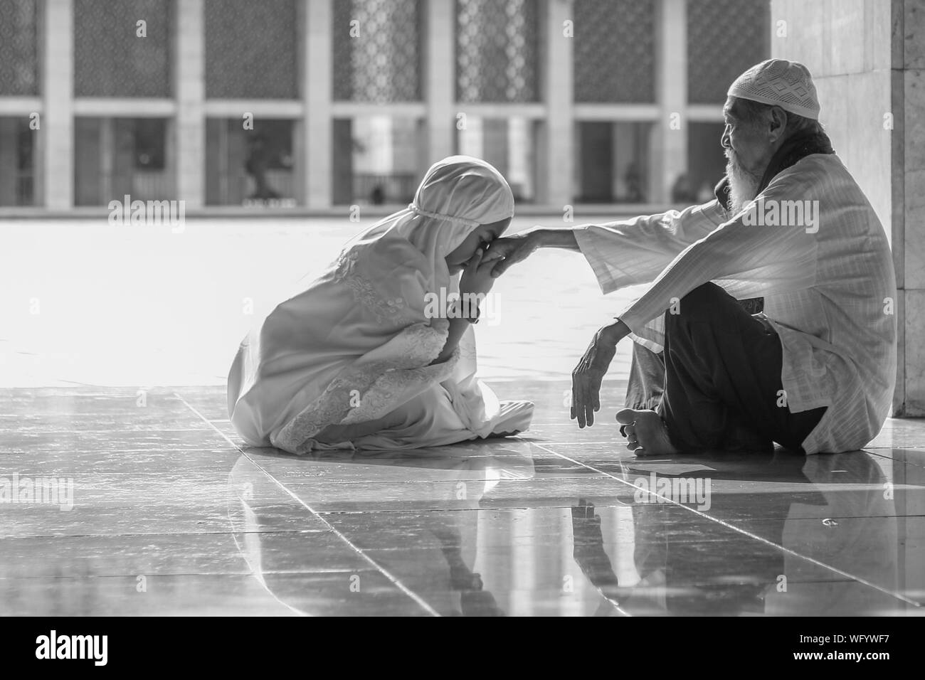 Forehead touching Black and White Stock Photos & Images - Alamy