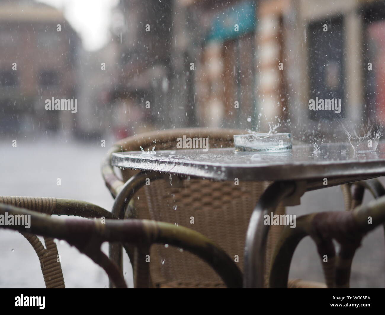 Rain on chairs hi-res stock photography and images - Alamy