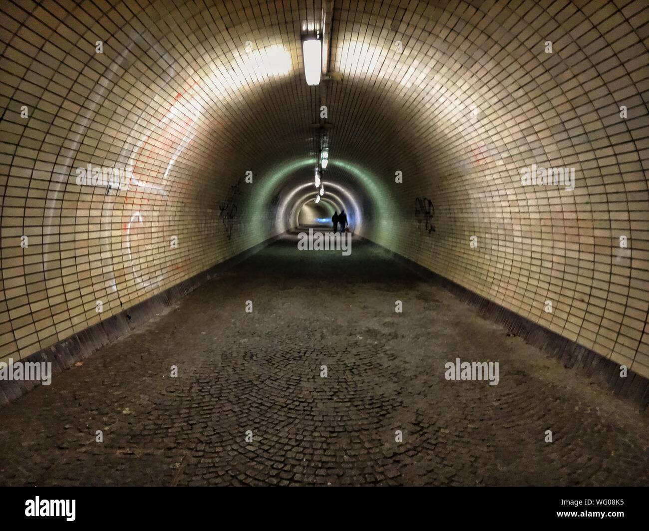Walking inside the tunnel hi-res stock photography and images - Alamy