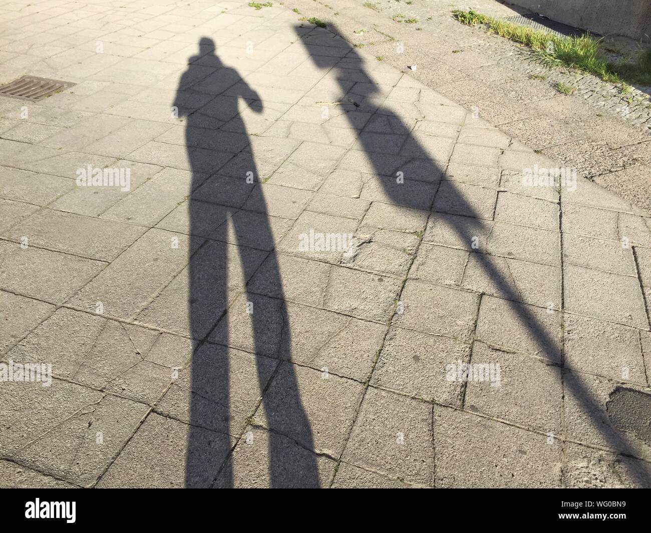Shadow pavement man hi-res stock photography and images - Alamy