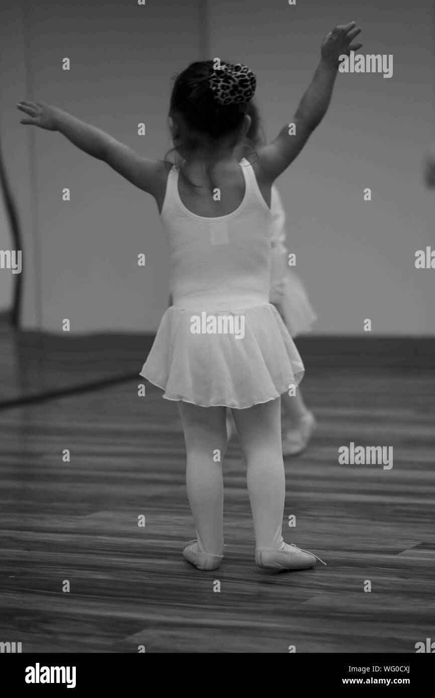 Ballerina Girl Dancing On Floorboard At Ballet Studio Stock Photo - Alamy