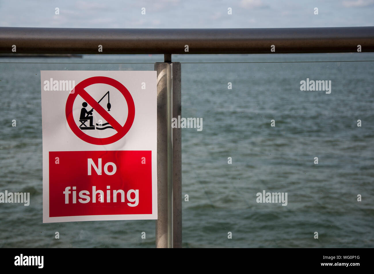 Warning on railing hi-res stock photography and images - Alamy