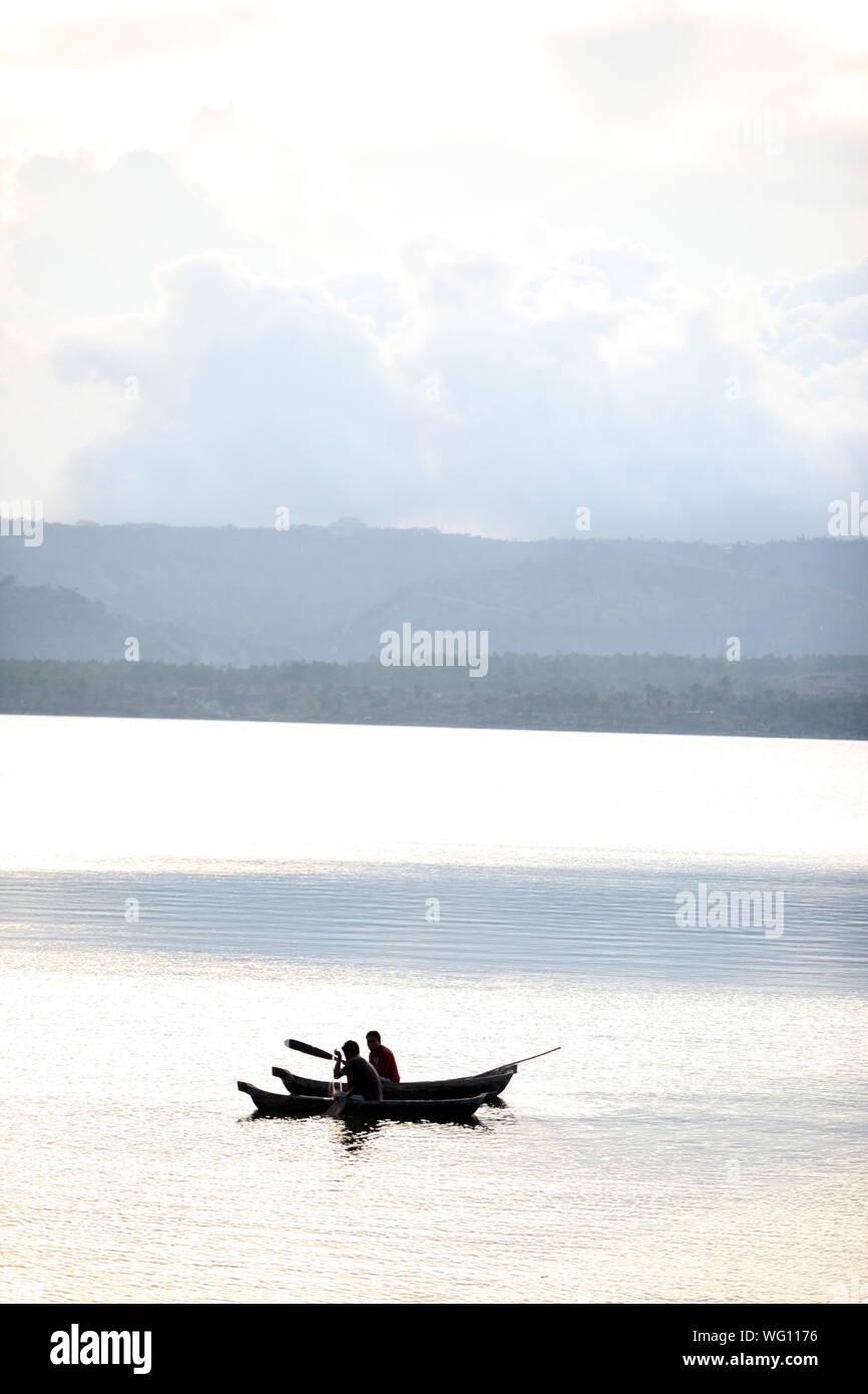 People Rowing Boats In Sea Stock Photo - Alamy