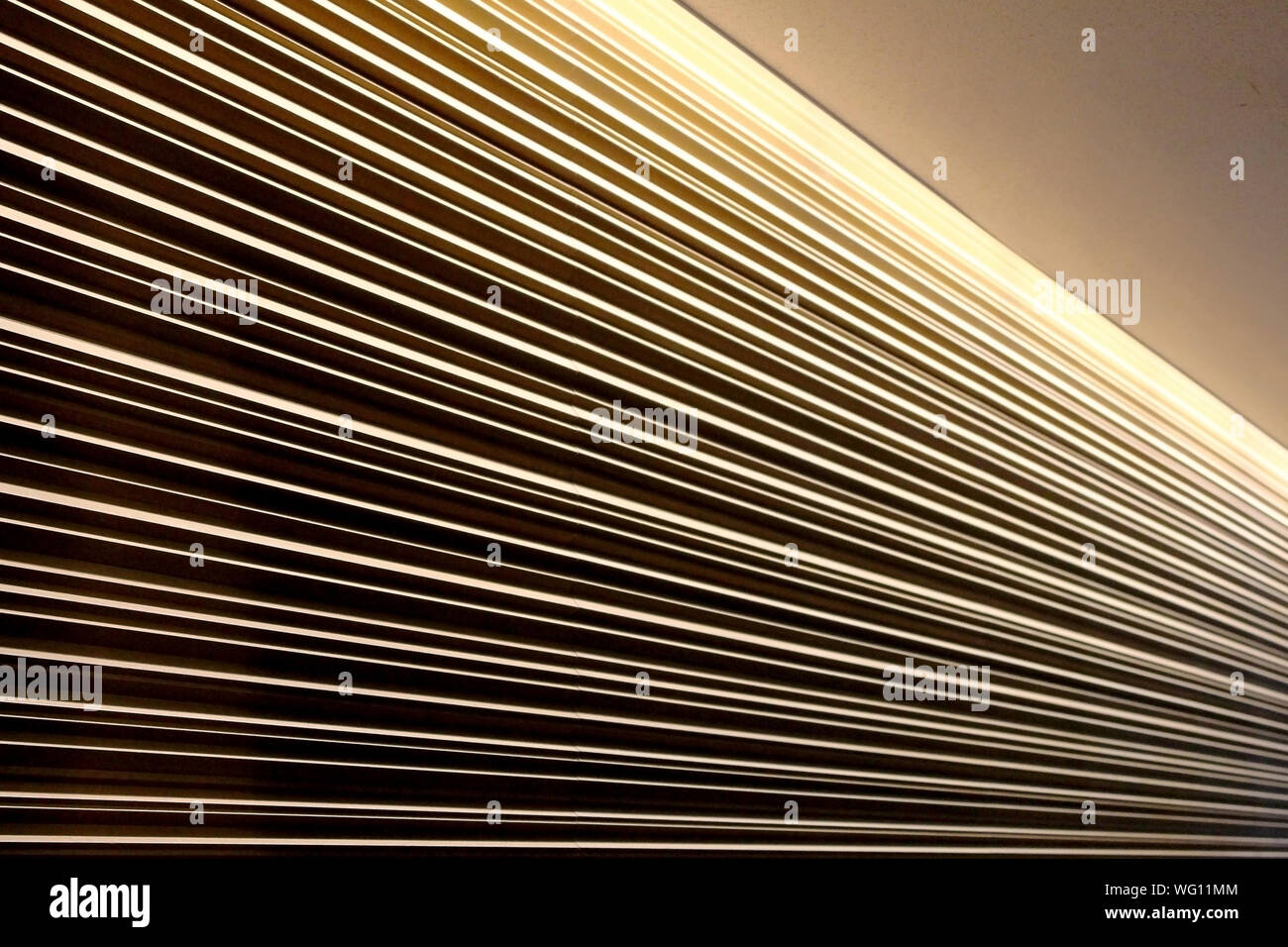 A contrasting wall that stands out in lighting Stock Photo - Alamy