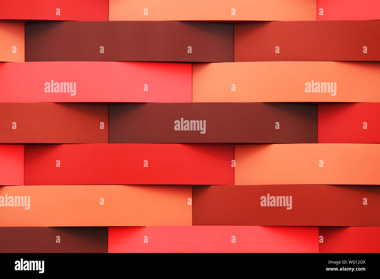 Wall of geometric pattern characterized by red gradation Stock Photo ...