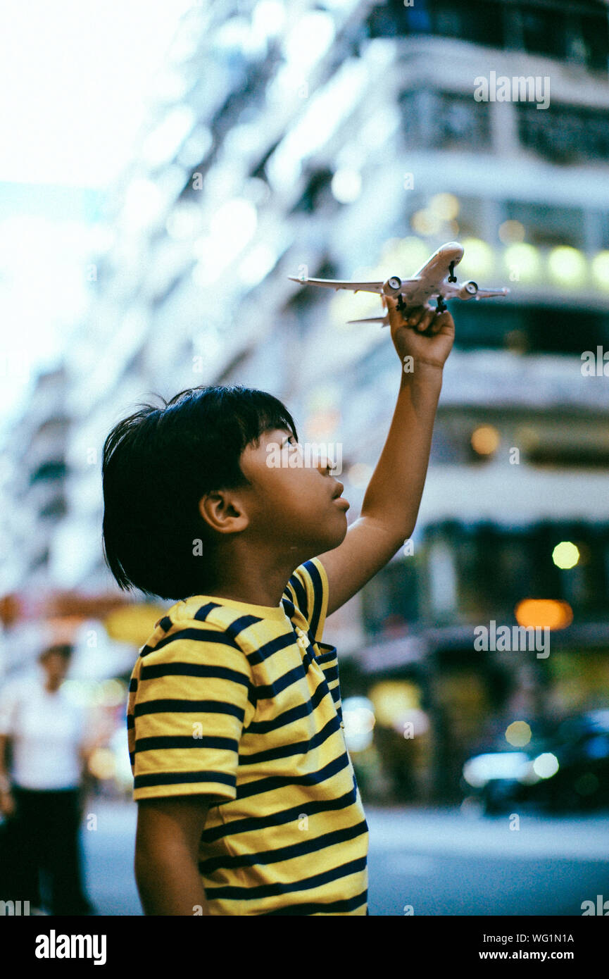 Boy with model airplane hi-res stock photography and images - Alamy