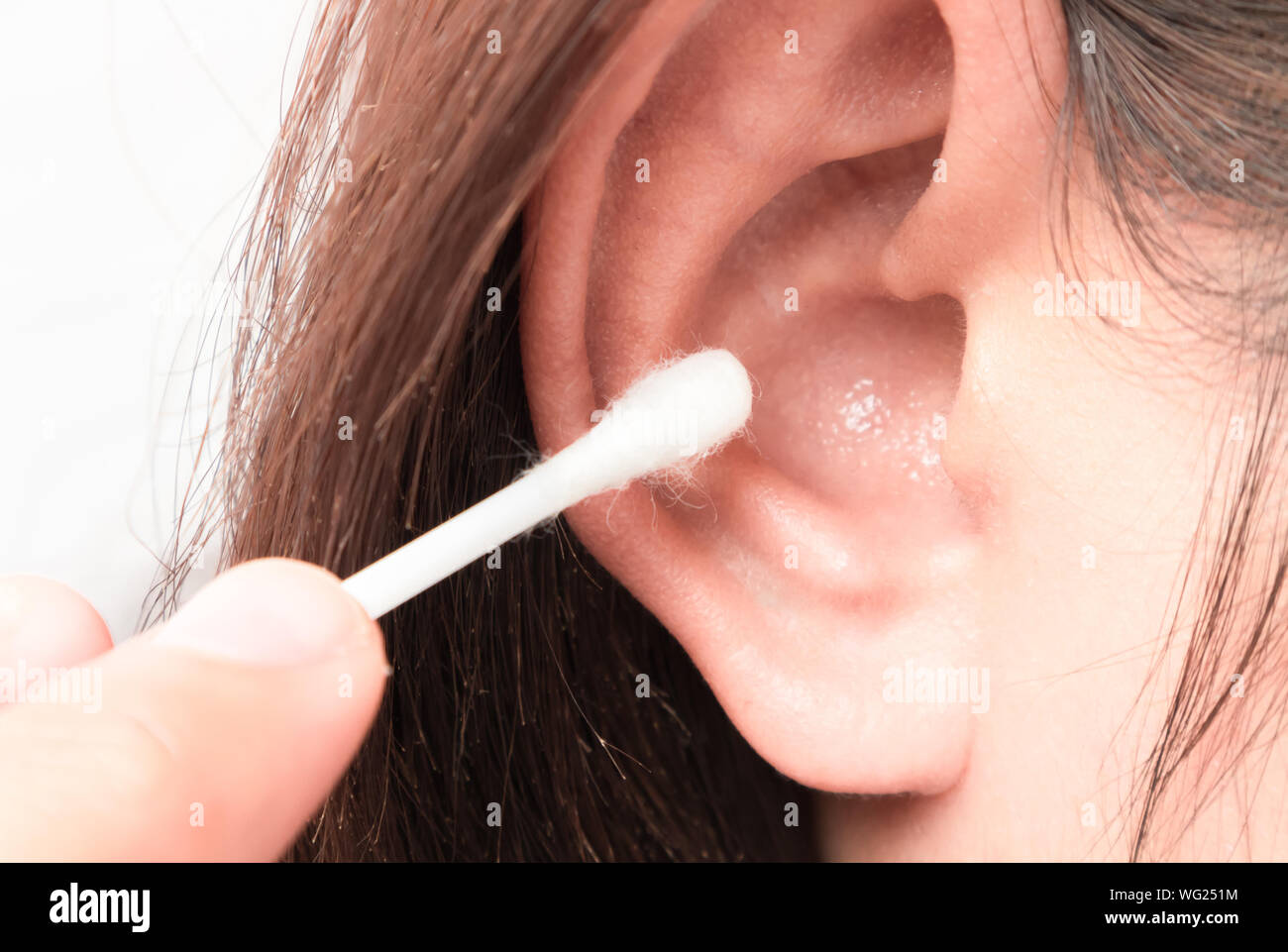 Ear cleaning hi-res stock photography and images - Alamy