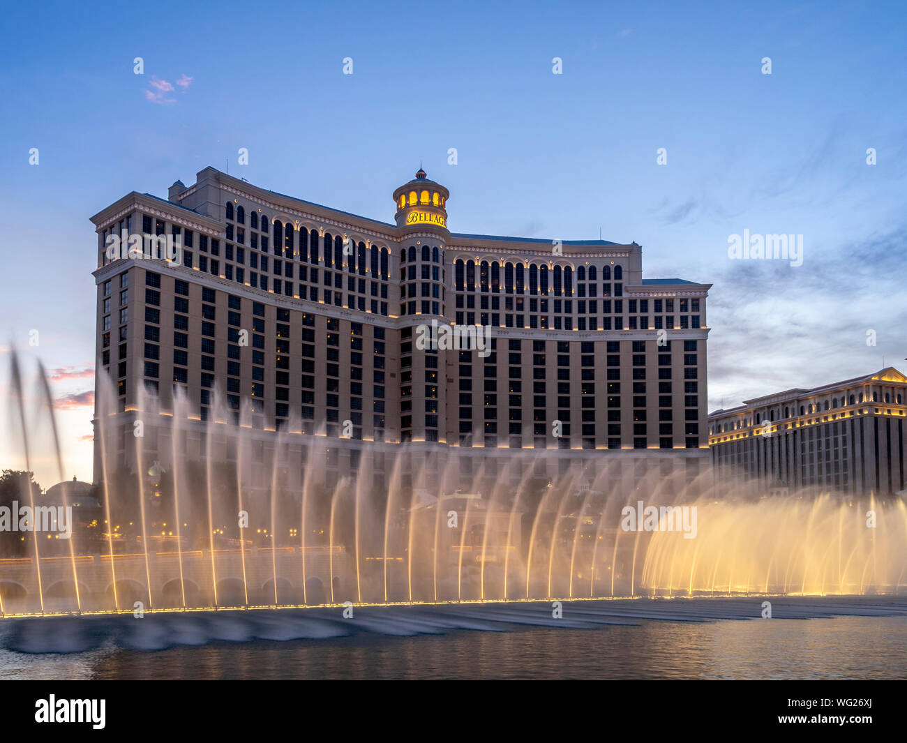 The Fountains of Bellagio Resort and Casino at dusk. The fountains of ...