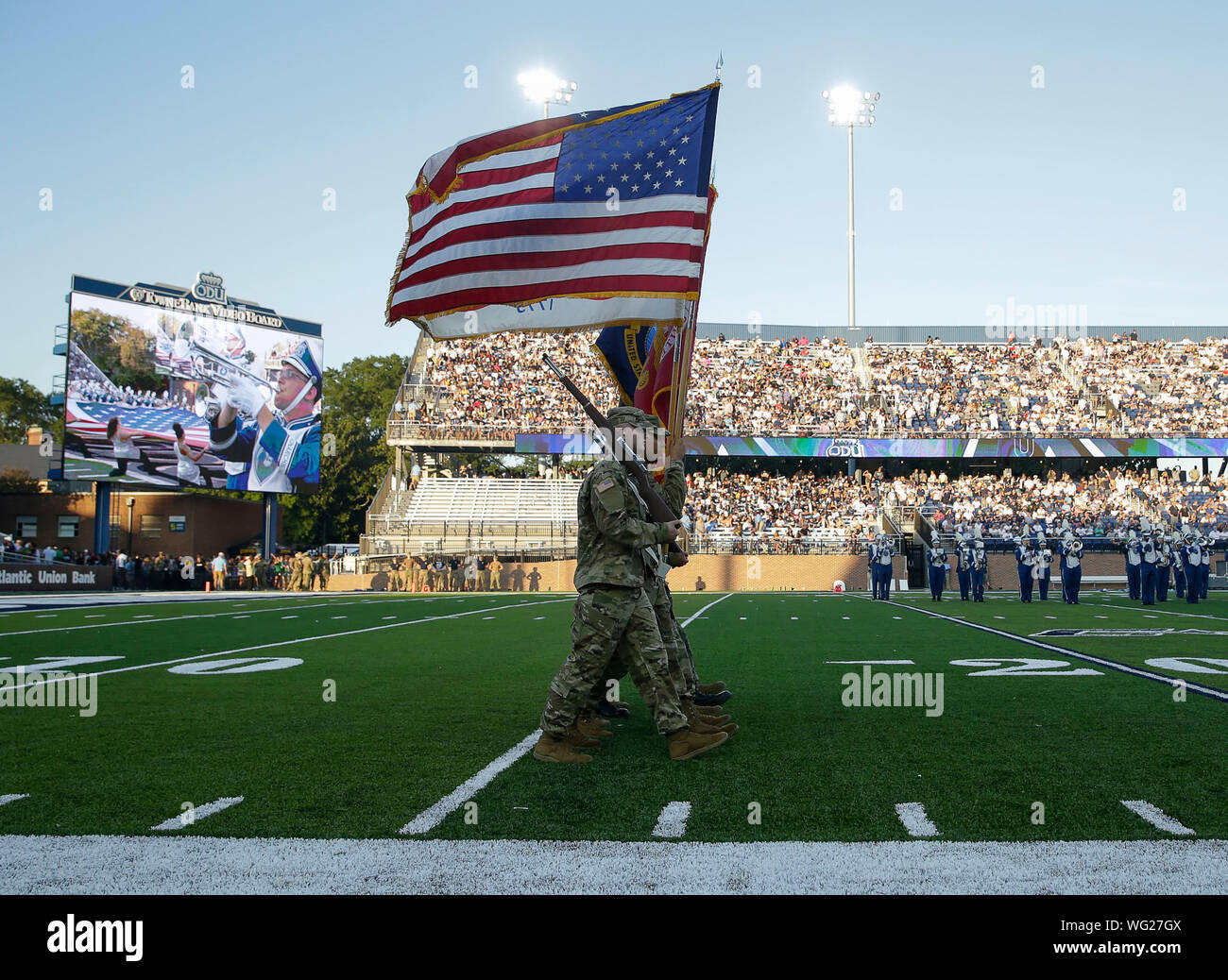 August 31, 2019: ODU ROTC color guard march the the American flag to ...
