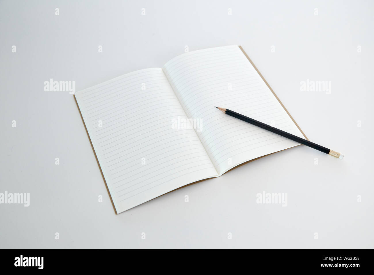Book and pencil hi-res stock photography and images - Alamy