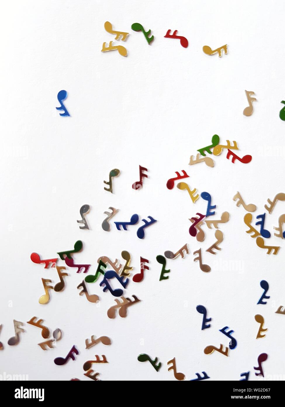 Close-up Of Colorful Musical Notes Over White Background Stock Photo ...